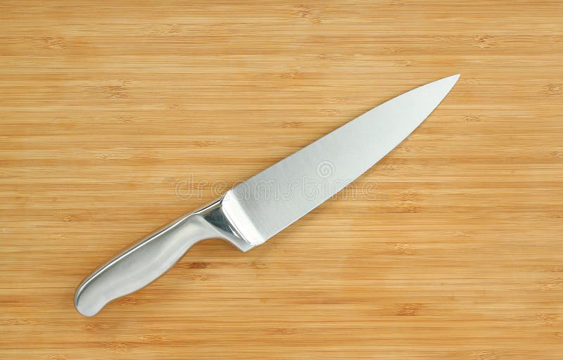 Steel Kitchen Knives on a Wood Board, Top View Stock Photo - Image of ...