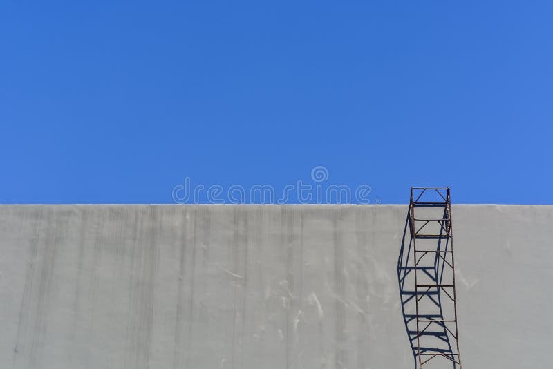 Steel Ladder on Wall stock photo. Image of stair, steel - 56734686