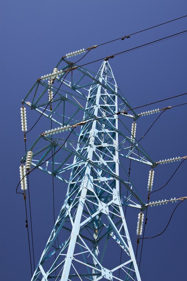 Steel-lattice Transmission Tower Against Deep-blue Sky Stock Photo ...