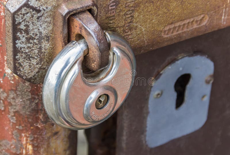 Steel lock on rusty gate stock photo. Image of closed - 30582034