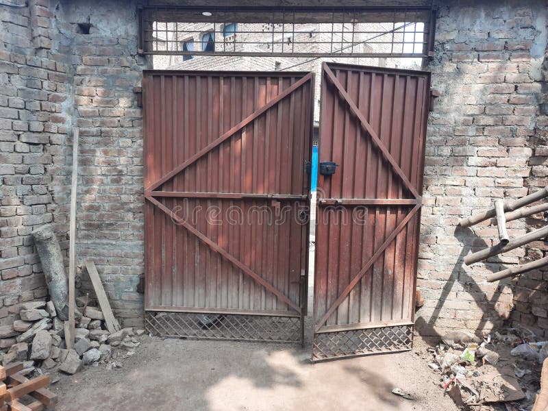 Steel Maded Gate for Workshop Stock Image - Image of steel, brickwork ...