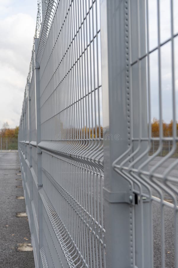 Steel Mesh Section of Portable Gray Galvanized Steel Fence Close-up ...