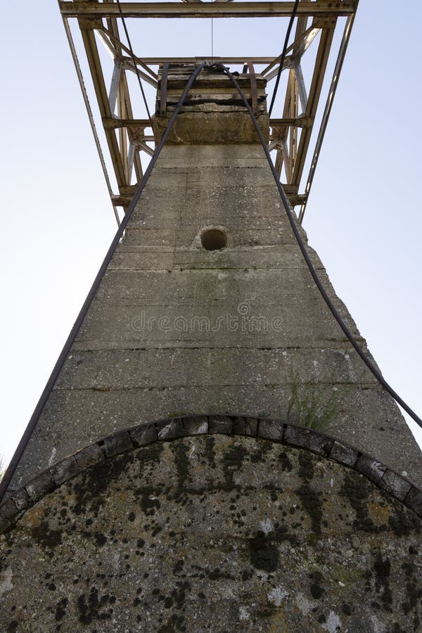 Steel Metal Cable Next To Old Abandoned Mining Tower Structure on a ...