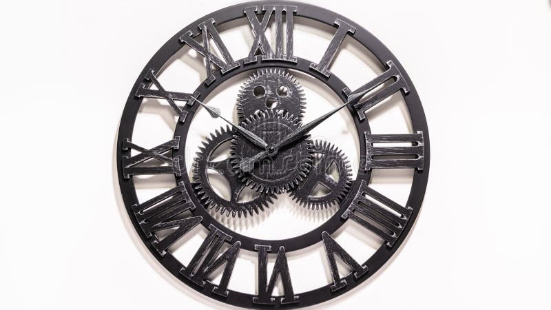 Steel Metal Wall Clock with Black Time Pointer Off Center on White ...