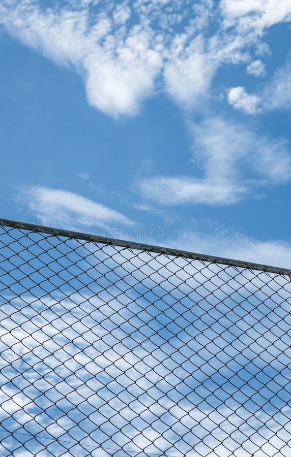 Steel Net Fence Against Blue Sky Stock Photo - Image of chain, cage ...