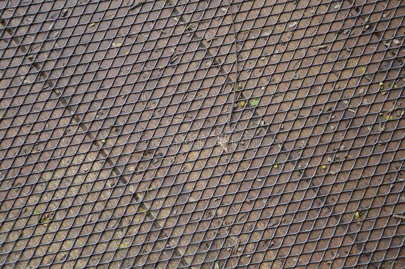 Steel net on wood floor stock image. Image of wood, floor - 76872481