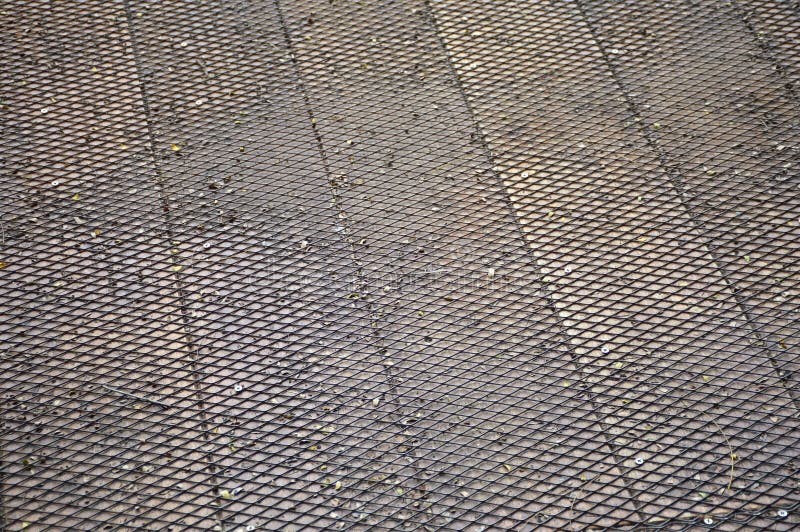 Steel net on wood floor stock image. Image of rugged - 77374593