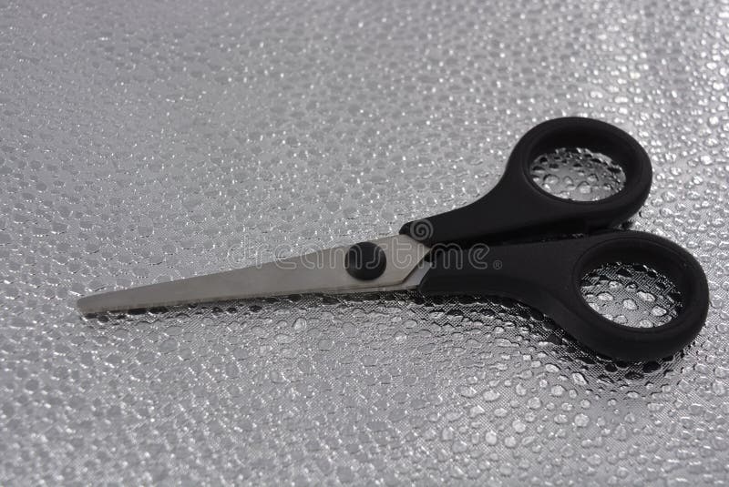 Steel Original Scissors on an Unusual Silver Background with Drops with ...