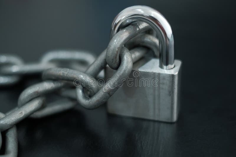 Steel Padlock and Blurred Chain. Stock Image - Image of equipment ...