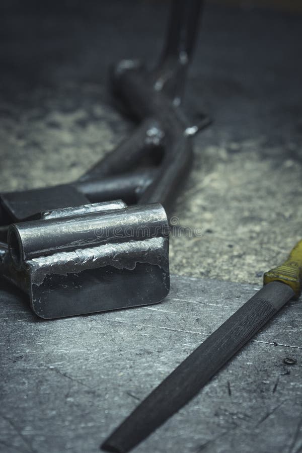 Steel Pipe Products and Metal File on a Working Table Stock Photo ...