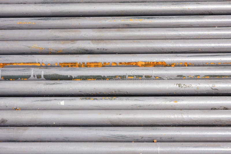 Steel pipes background stock photo. Image of bundle, pile - 24800574