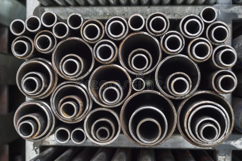 Steel pipes background stock image. Image of arranged - 65368469