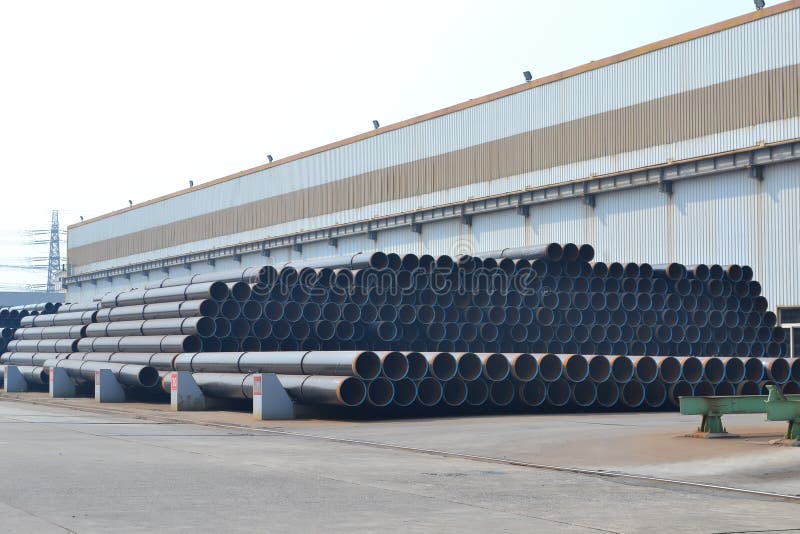 Steel Pipes Stacked stock photo. Image of grass, engineering - 25862780