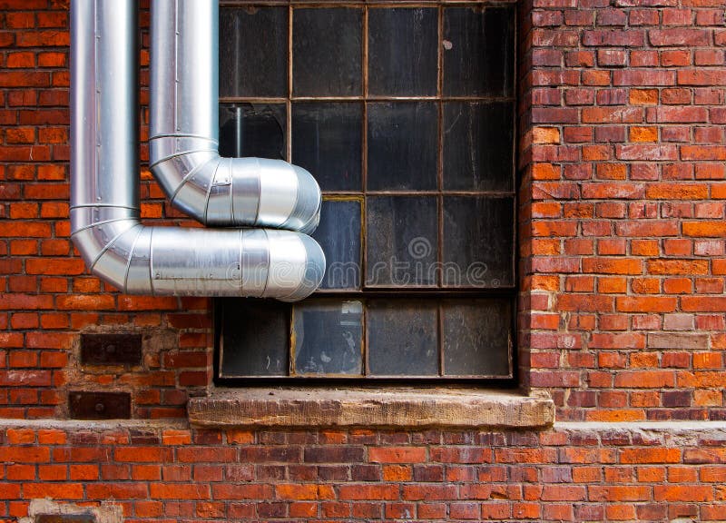 Steel Pipes Outside the Window of Brick Building Stock Photo - Image of ... Steel Pipes Outside the Window of Brick Building Stock Photo - Image of ...