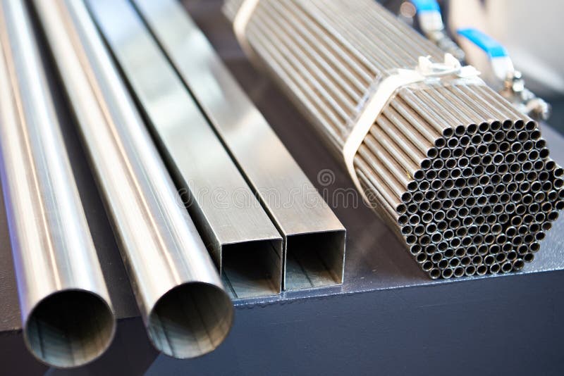 Steel pipes in stack stock photo. Image of aluminum - 163946924