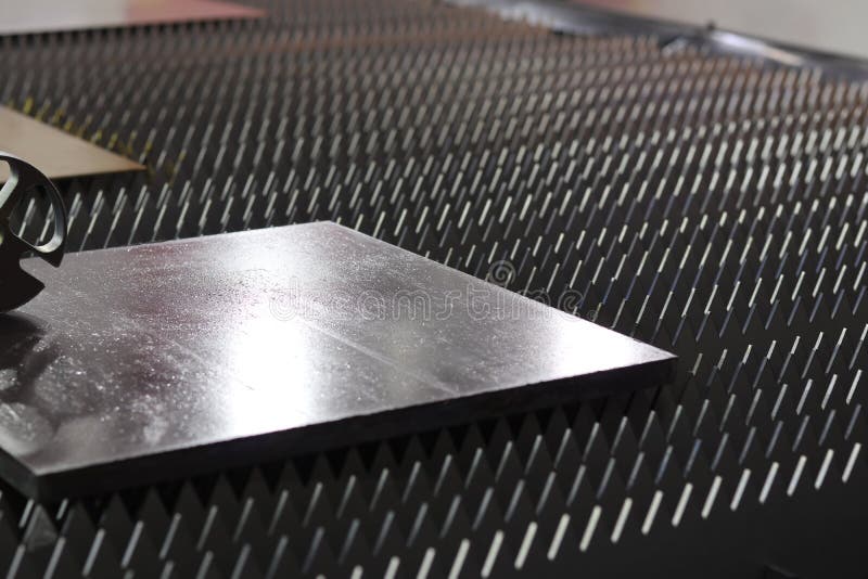 A Steel Plate on Machine , Ready for Processing Stock Photo - Image of ...