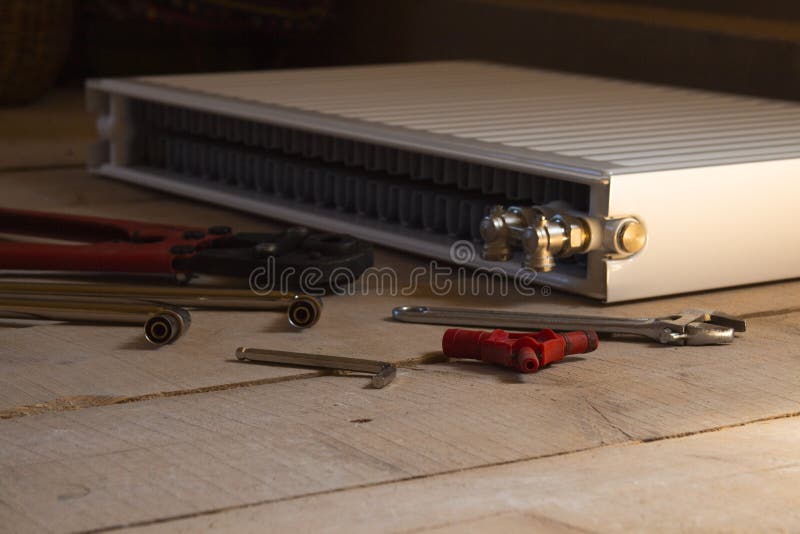 Steel Radiator and Assembly Tool. Heating Repair Concept Stock Photo ...