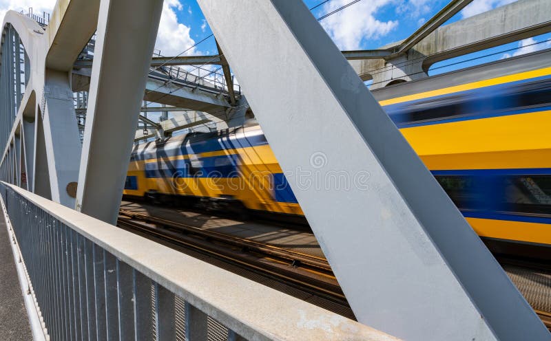 Steel Railroad Bridge with a Passing Train Stock Photo - Image of ...
