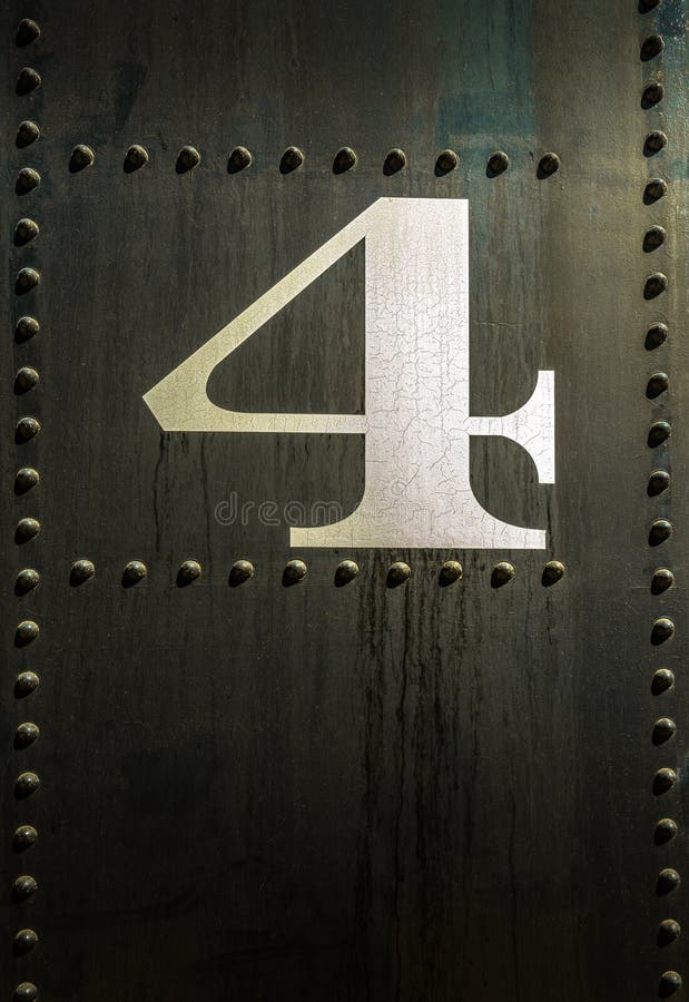 4 on Steel with Rivets stock image. Image of sign, darkness - 328909507