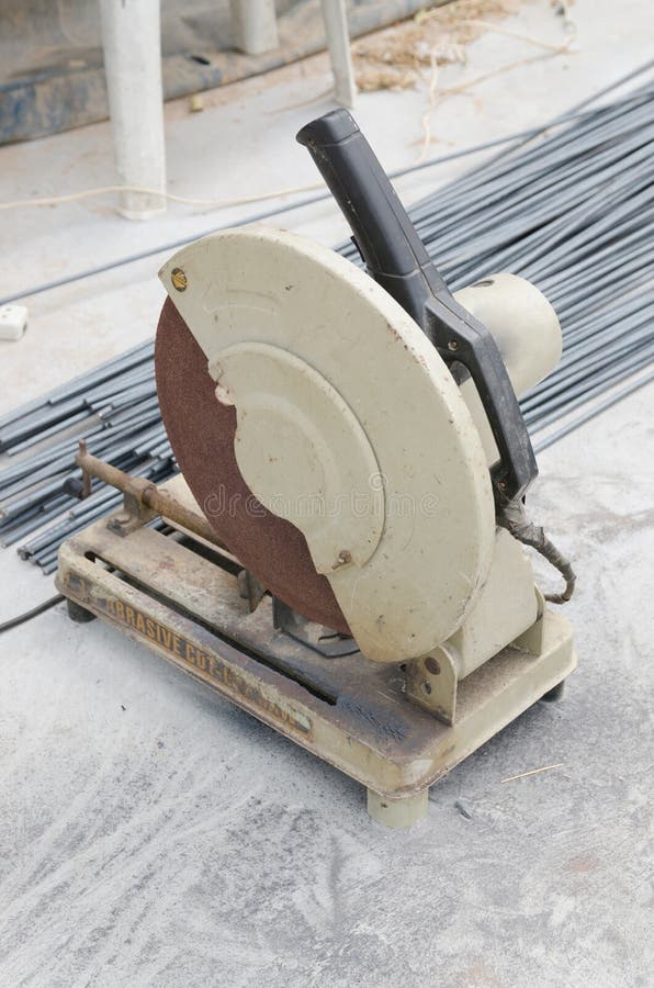 Steel rod cutting machine. stock photo. Image of steel - 38761816