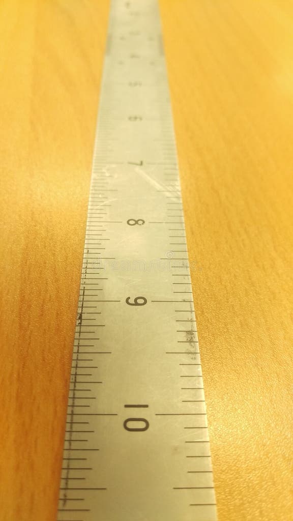 Steel ruler on table stock photo. Image of table, park - 107559114