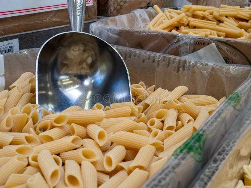 Steel Scoop Resting in Large Box of Penne Pasta Stock Image - Image of ...