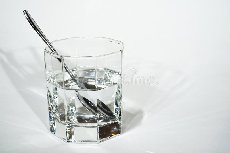 Spoon in a Glass with Clear Water Stock Photo - Image of health, food ...