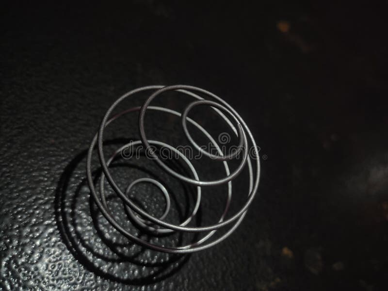 Steel spring shaker stock image. Image of light, lighting - 243624127