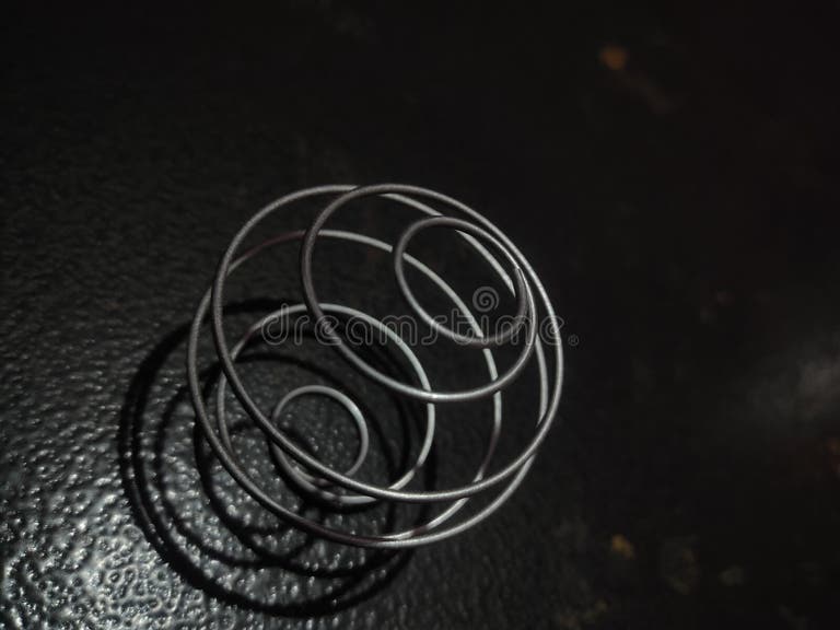 Steel spring shaker stock image. Image of light, lighting - 243624127
