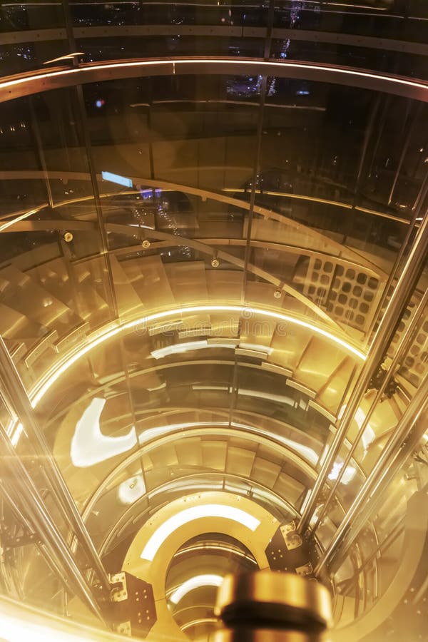 Steel Structure Spiral Staircase at Night with Warm Lights Stock Image ...