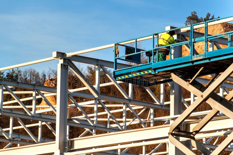 The Steel Structure is Under Construction. Installation of Metal Halls ...