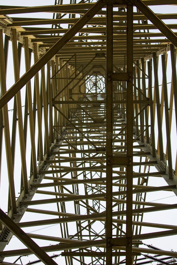 Steel Struts Inside a Power Pole Photographed into the Blue Sky Stock ...