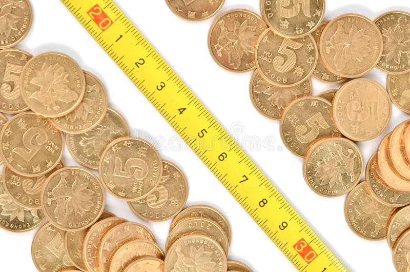 Steel tape and coin stock photo. Image of measurement - 26178220