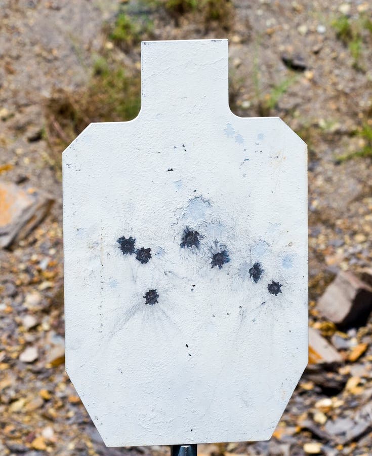 Target with bullet holes stock photo. Image of bullseye - 2980284
