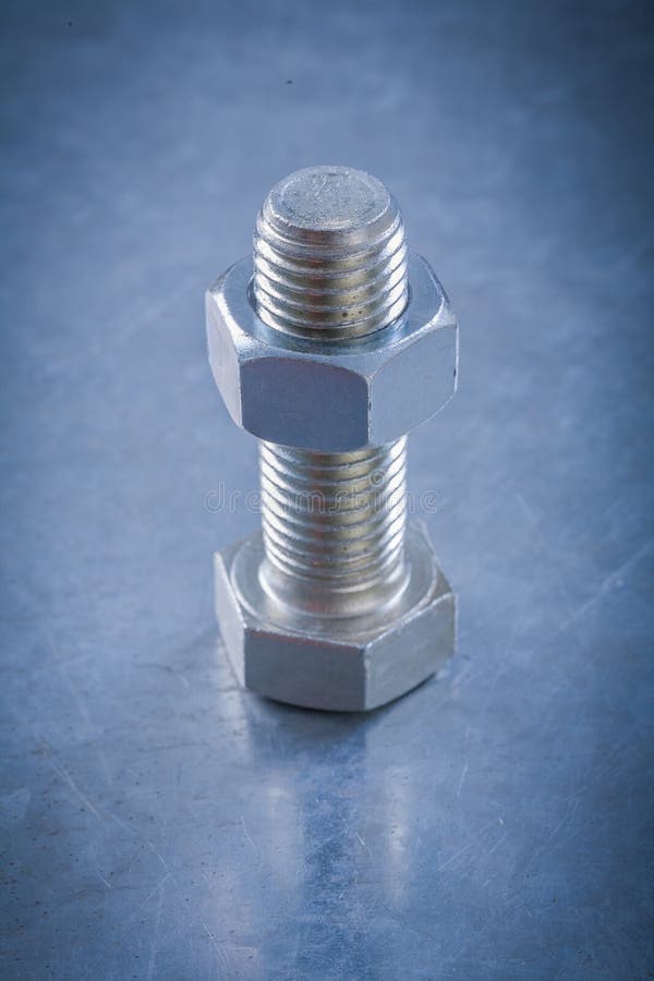 Steel Threaded Bolt and Nut on Metallic Background Construction Stock ...