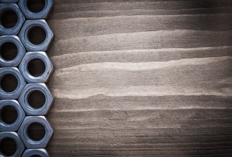 Steel Threaded Construction Nuts on Vintage Wooden Surface Const Stock ...