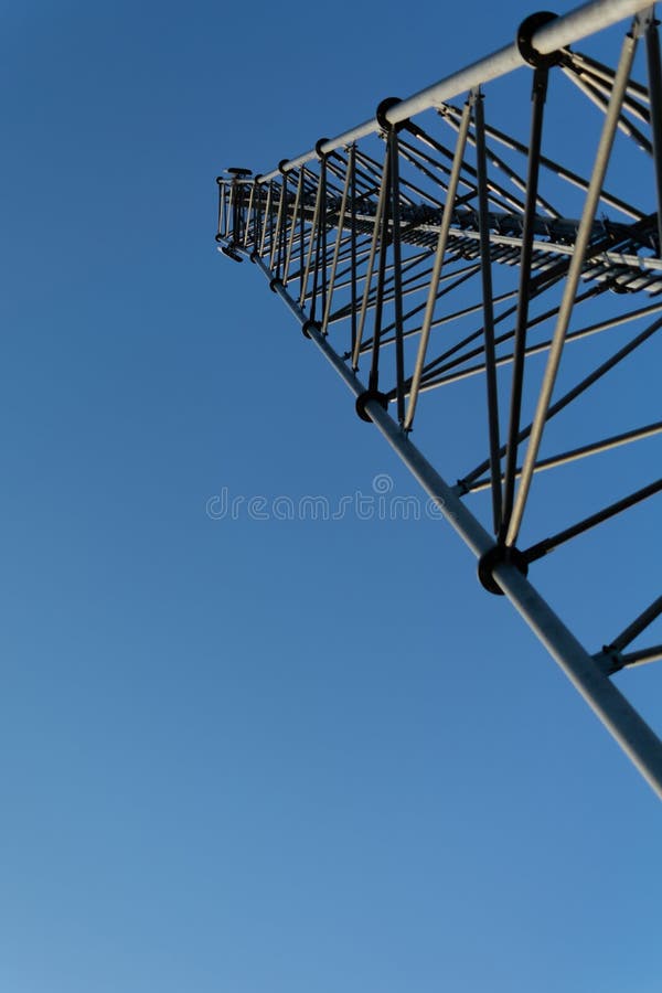 Steel tower construction stock photo. Image of reflector - 137247090