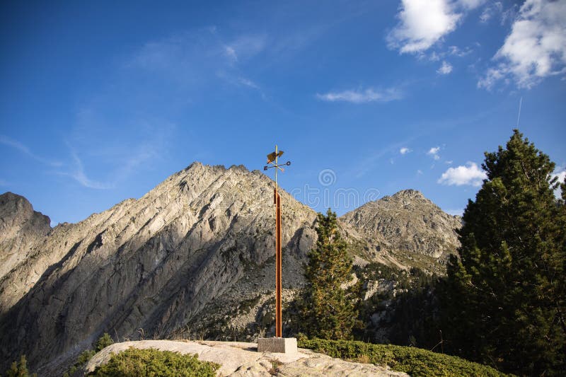 Steel Wind Direction Indicator with Arrow in the Mountains Stock Photo ...