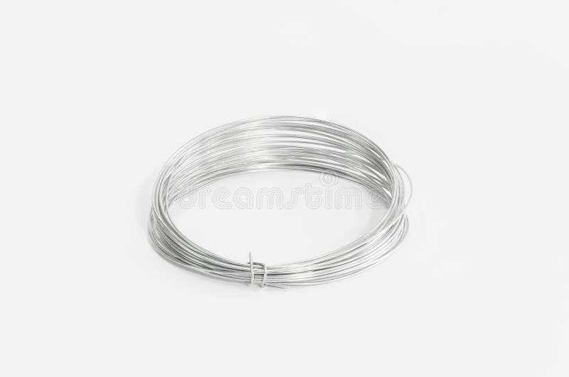 Steel Wire Round in a Coil Against Stack Stock Photo - Image of ...