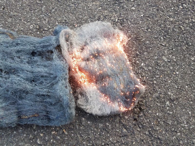 Steel Wool on Fire with Flames on Asphalt Stock Image - Image of burn ...