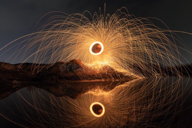 Steel wool lightpainting stock photo. Image of flame - 262519450