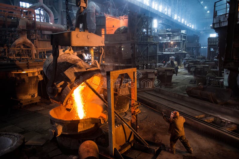 Steelworker at Work Near the Tanks with Hot Metal Stock Photo - Image ...