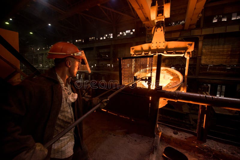 Steelworker at Work Near the Tanks with Hot Metal Stock Photo - Image ...