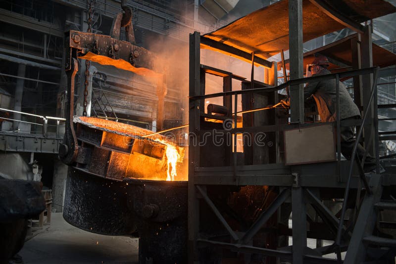 Steelworker at Work Near the Tanks with Hot Metal. Stock Photo - Image ...