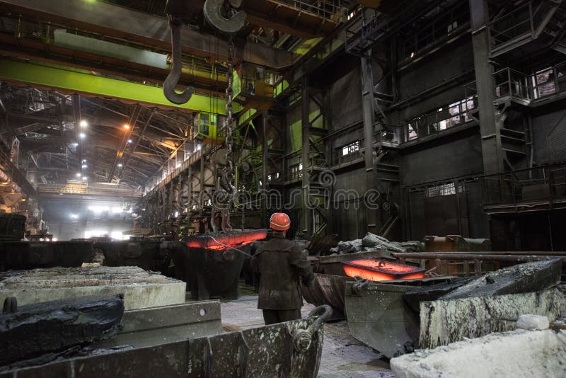 Steelworker at Work Near the Tanks with Hot Metal Stock Photo - Image ...