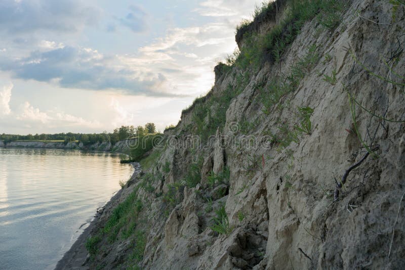 The Steep Bank of the River Stock Photo - Image of riverbank, natural ...