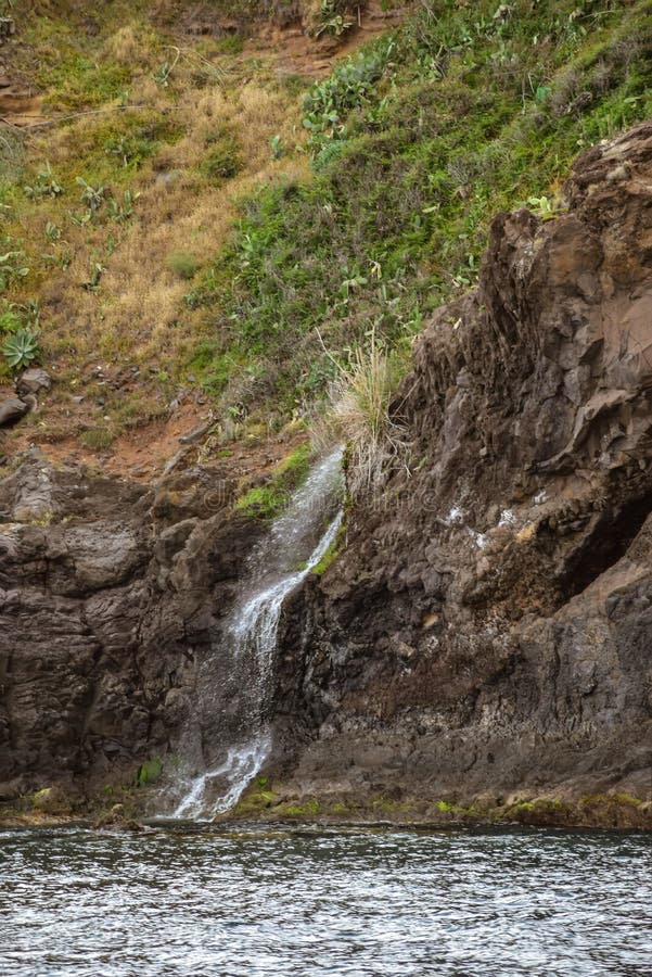 Steep Cliffs and Waterfall in Madeira and the Atlantic Ocean. Taken ...