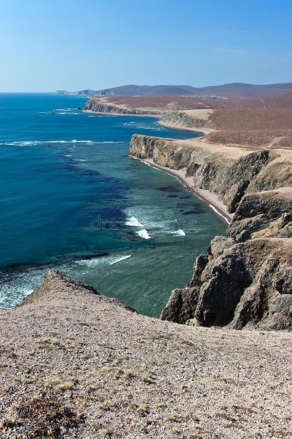 On the steep coast. stock image. Image of rock, people - 24473181