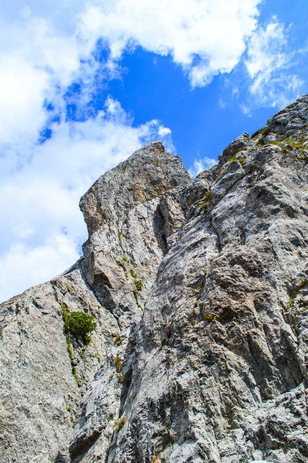 Steep mountain rocks stock photo. Image of season, grass - 32905646