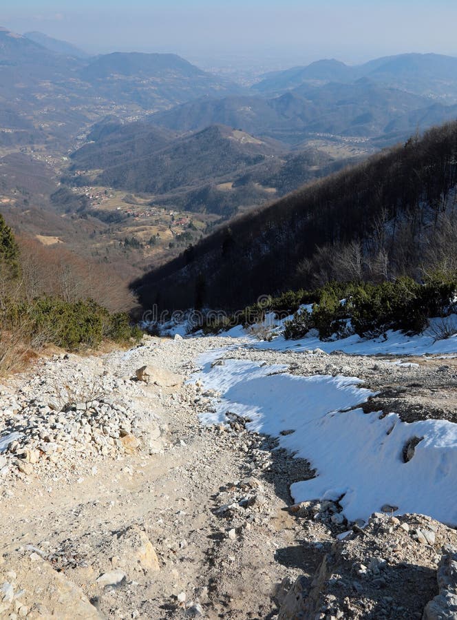 Steep Mountain Slope with a Landslide and Snow and Valley Below Stock ...